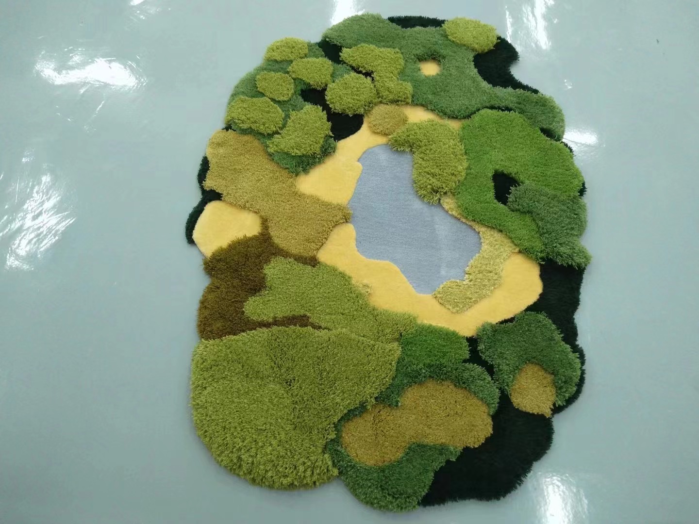 Beautiful custom made hand tufted moss rug